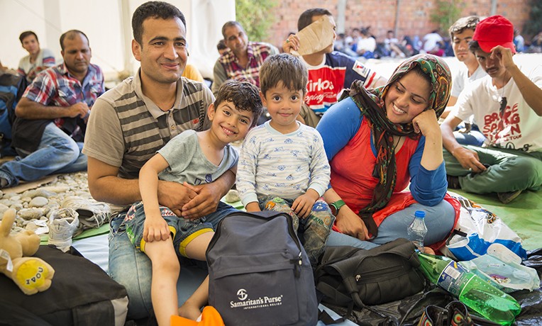 Refugees Receive Backpacks in Macedonia