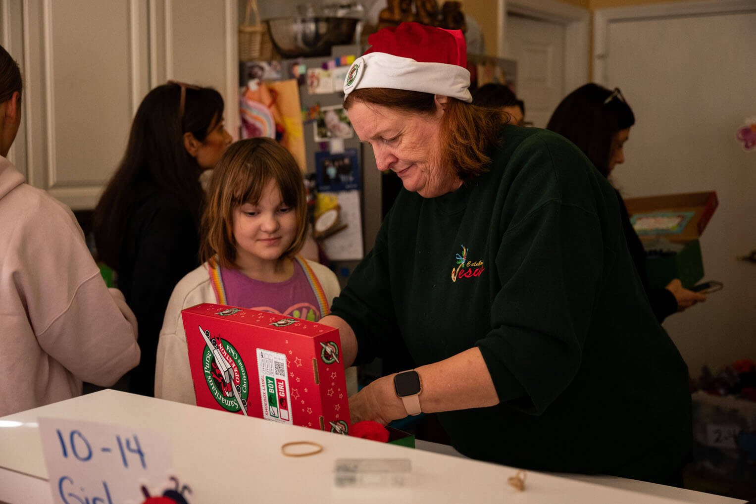 Shoebox Packing Party Sends God’s Love Around the Corner and the World